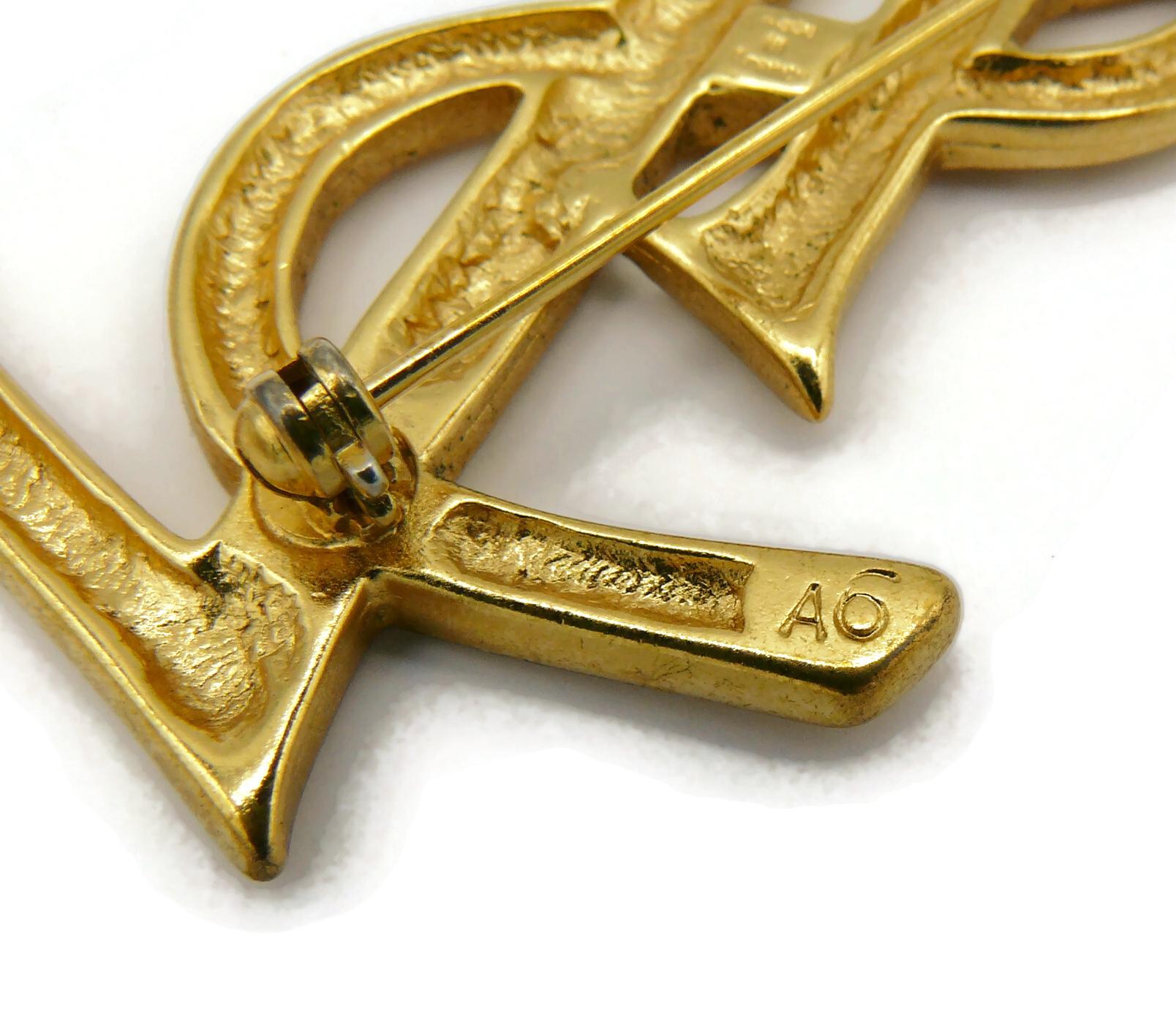 YVES SAINT LAURENT YSL Vintage Gold Tone Logo Brooch For Sale at ...