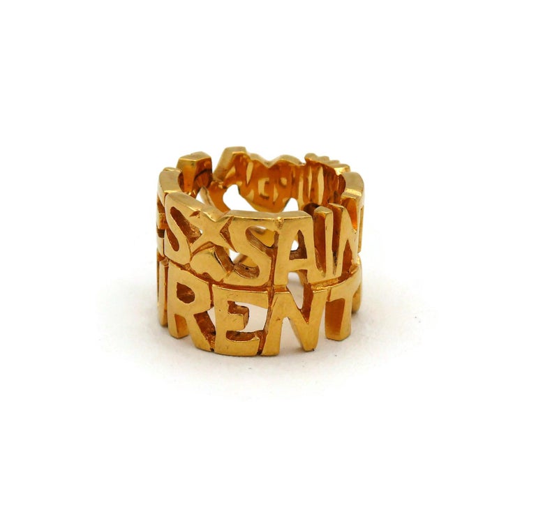 YVES SAINT LAURENT YSL Vintage Gold Tone Signature Ring For Sale at 1stDibs