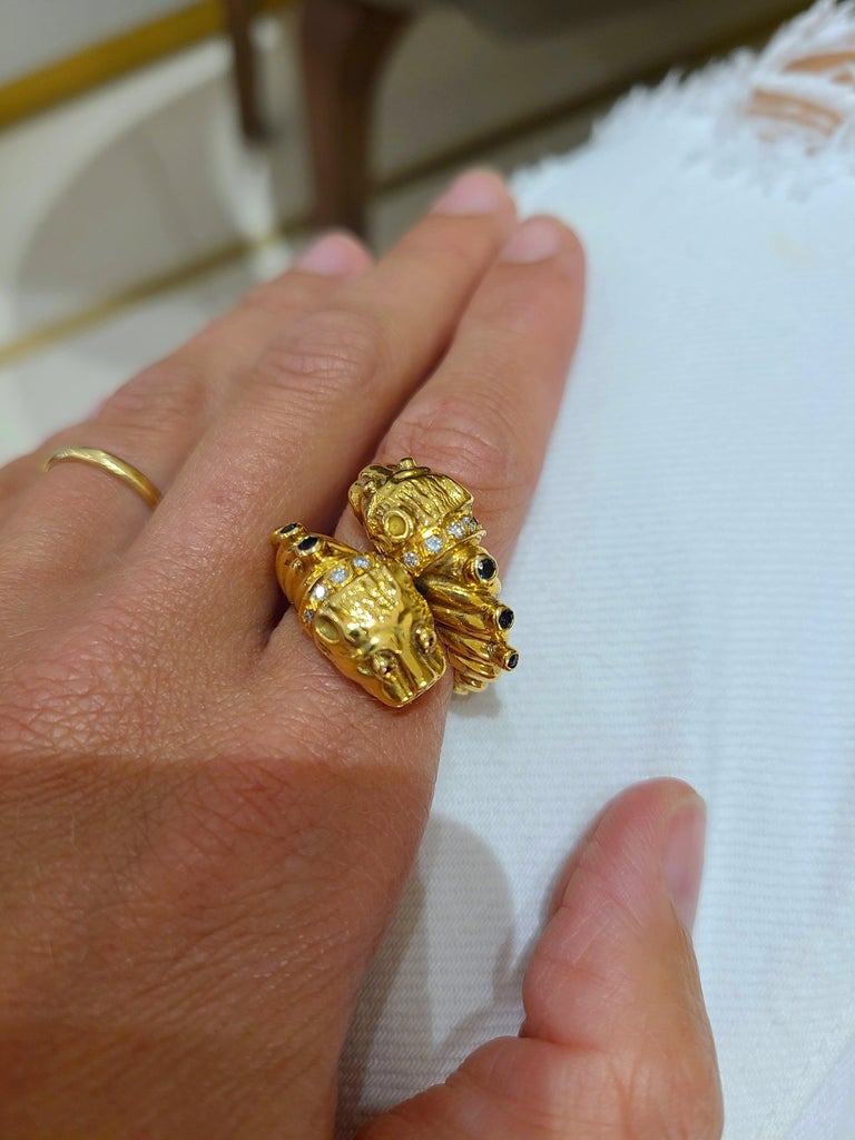 Zolotas 18-24 Karat Gold Twin Chimera Head Ring with Diamond and Blue ...