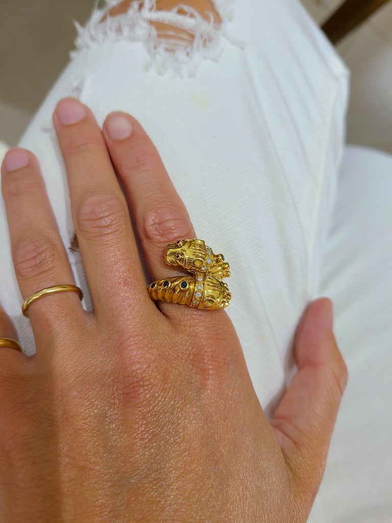 Zolotas 18-24 Karat Gold Twin Chimera Head Ring with Diamond and Blue ...